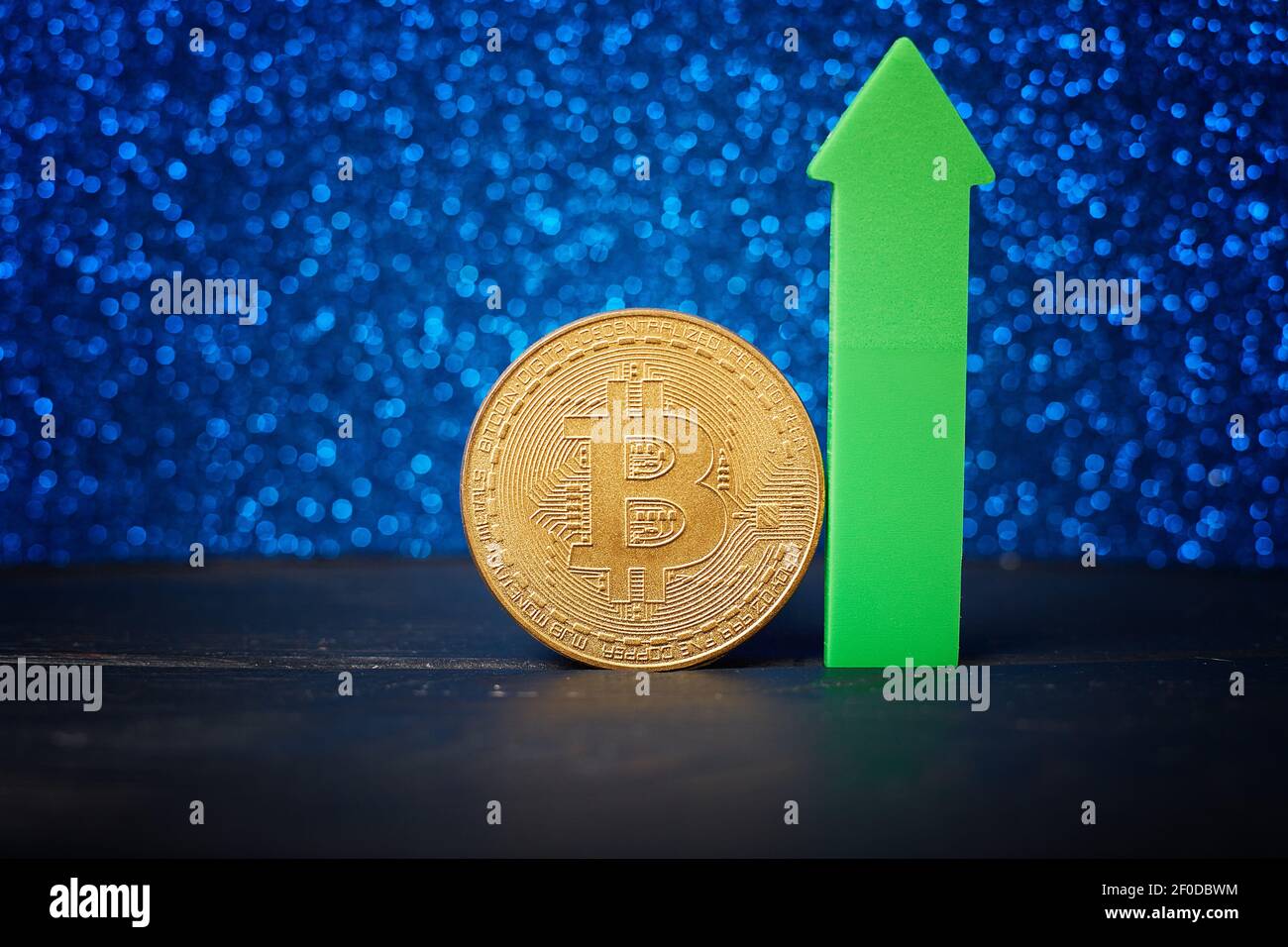 Bitcoins with Candle stick graph chart and digital background.Golden ...