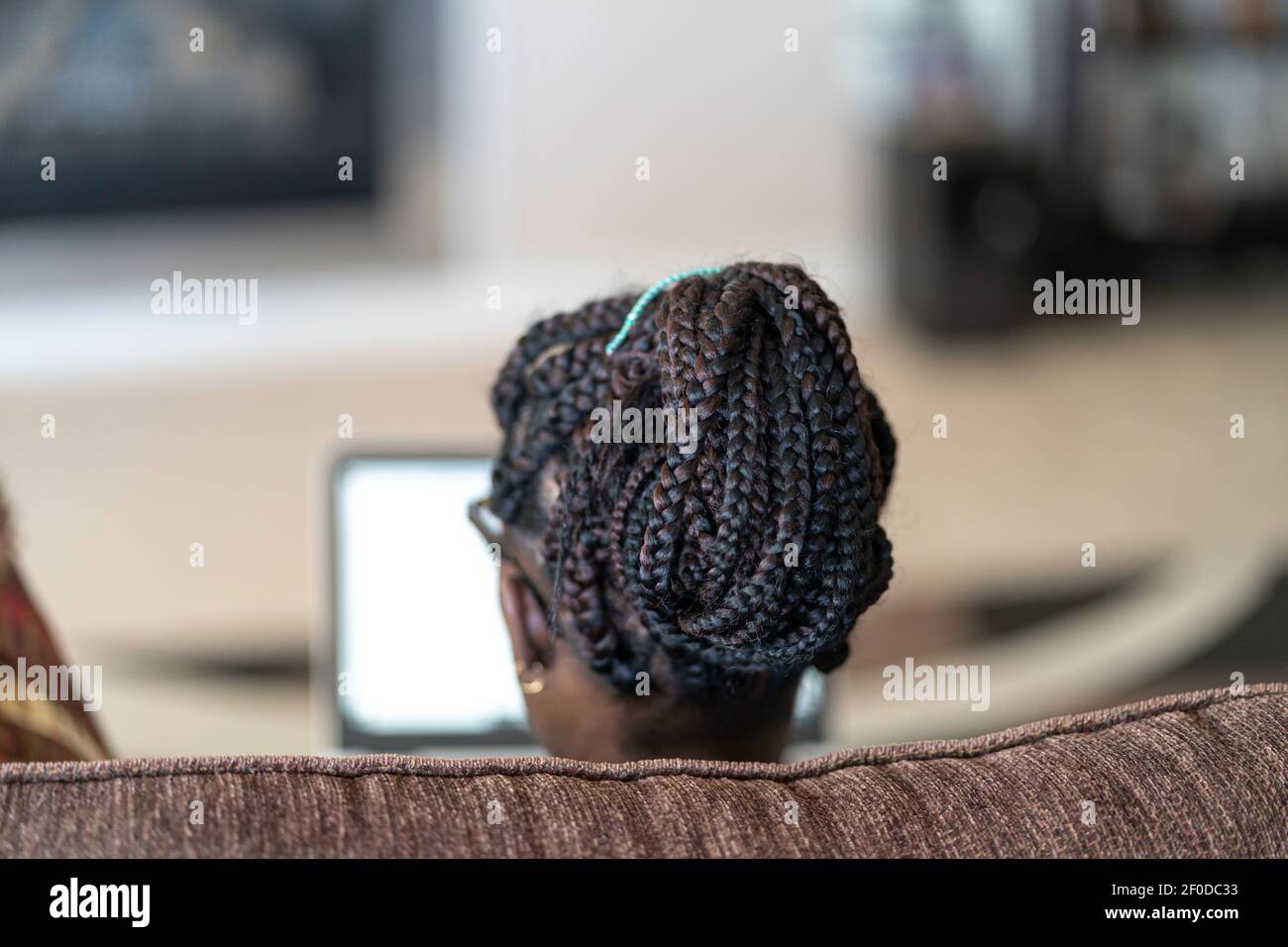 African American Nigerian woman working on her laptop from home Stock ...
