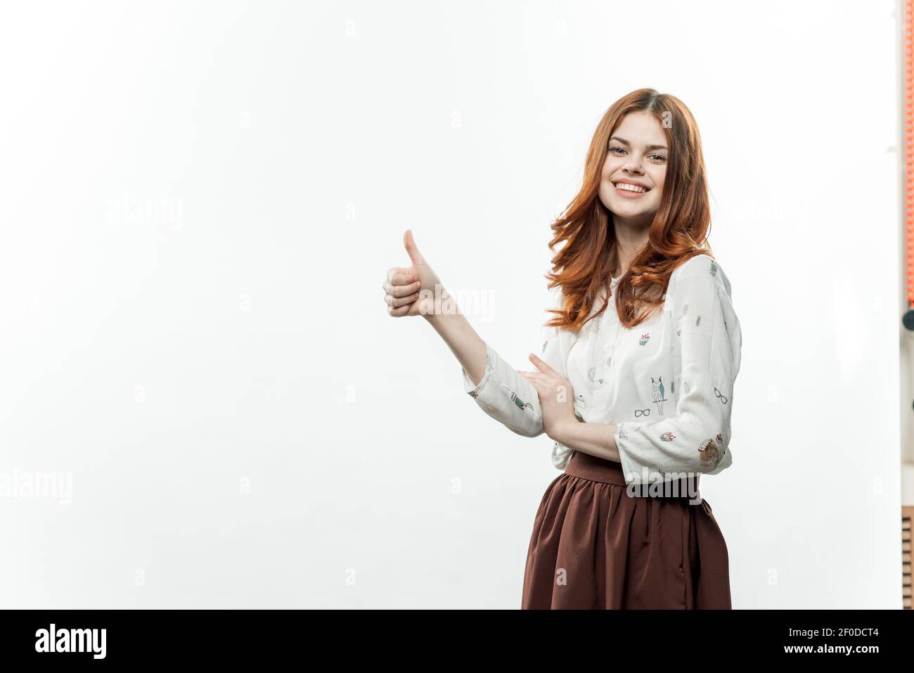 Excited woman with hand to her chest hi-res stock photography and ...