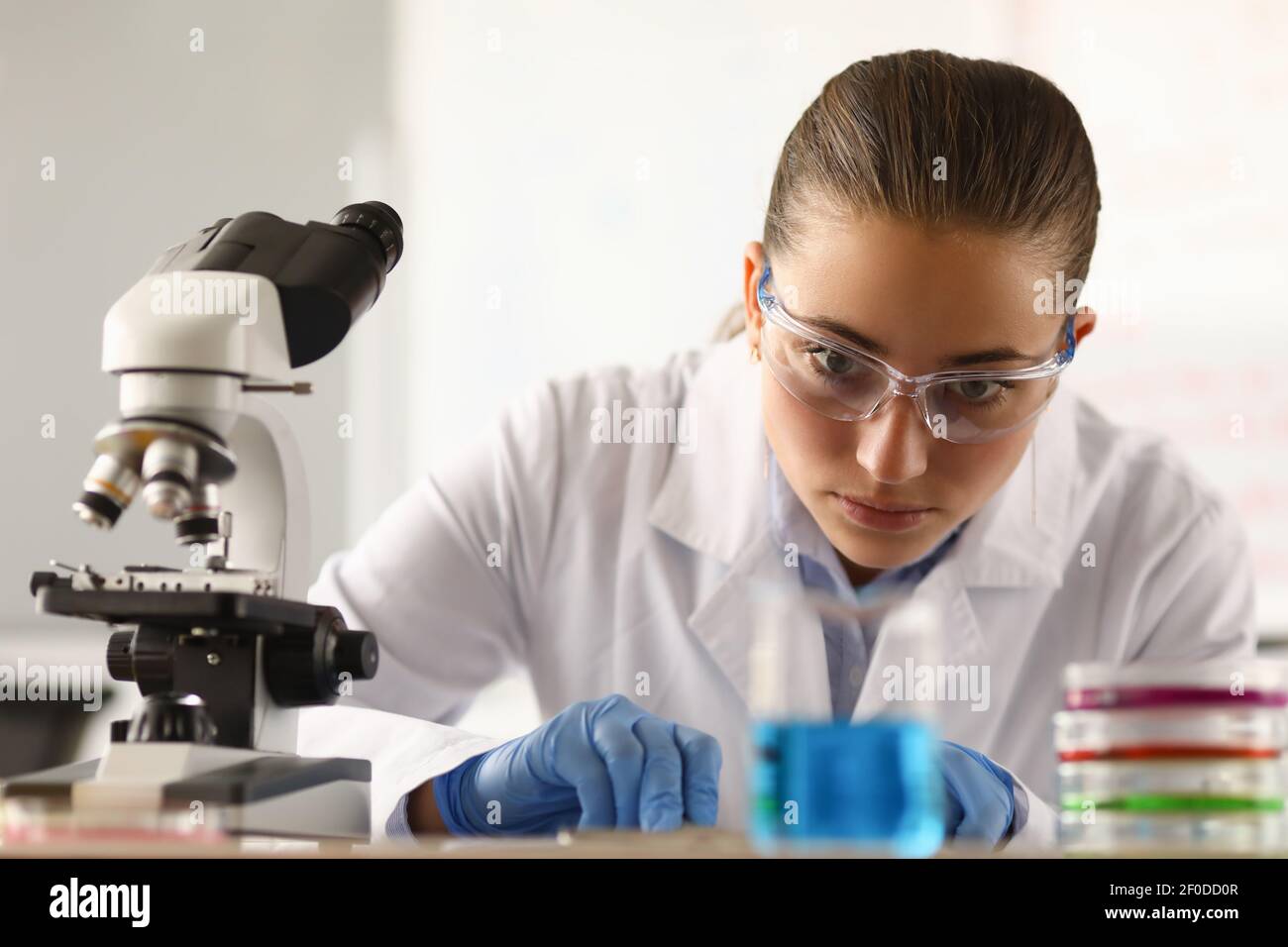 Woman chemist conducting scientific experiments in laboratory Stock ...