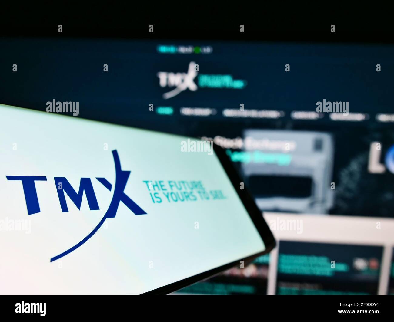 Smartphone with logo of Canadian financial services company TMX Group ...