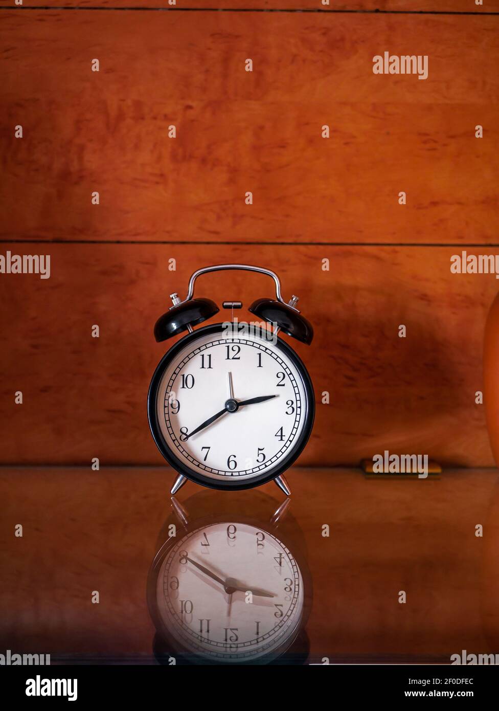 black vintage or retro alarm clock Stock Photo - Alamy