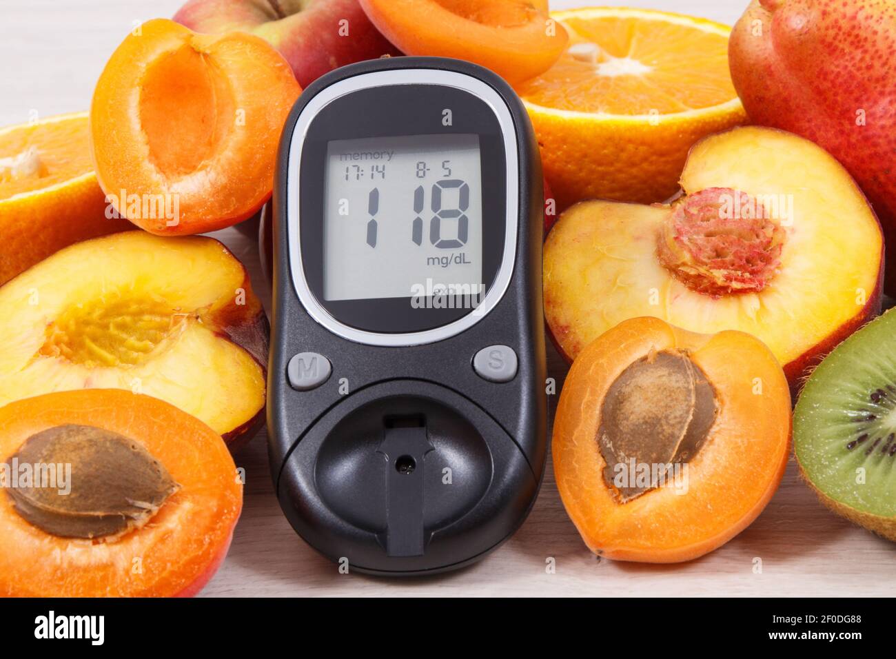 Glucometer for checking sugar level and fresh healthy nutritious food ...