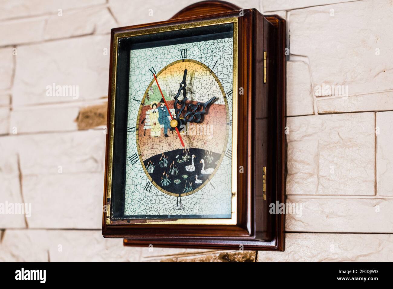 Hanging clock hi-res stock photography and images - Alamy