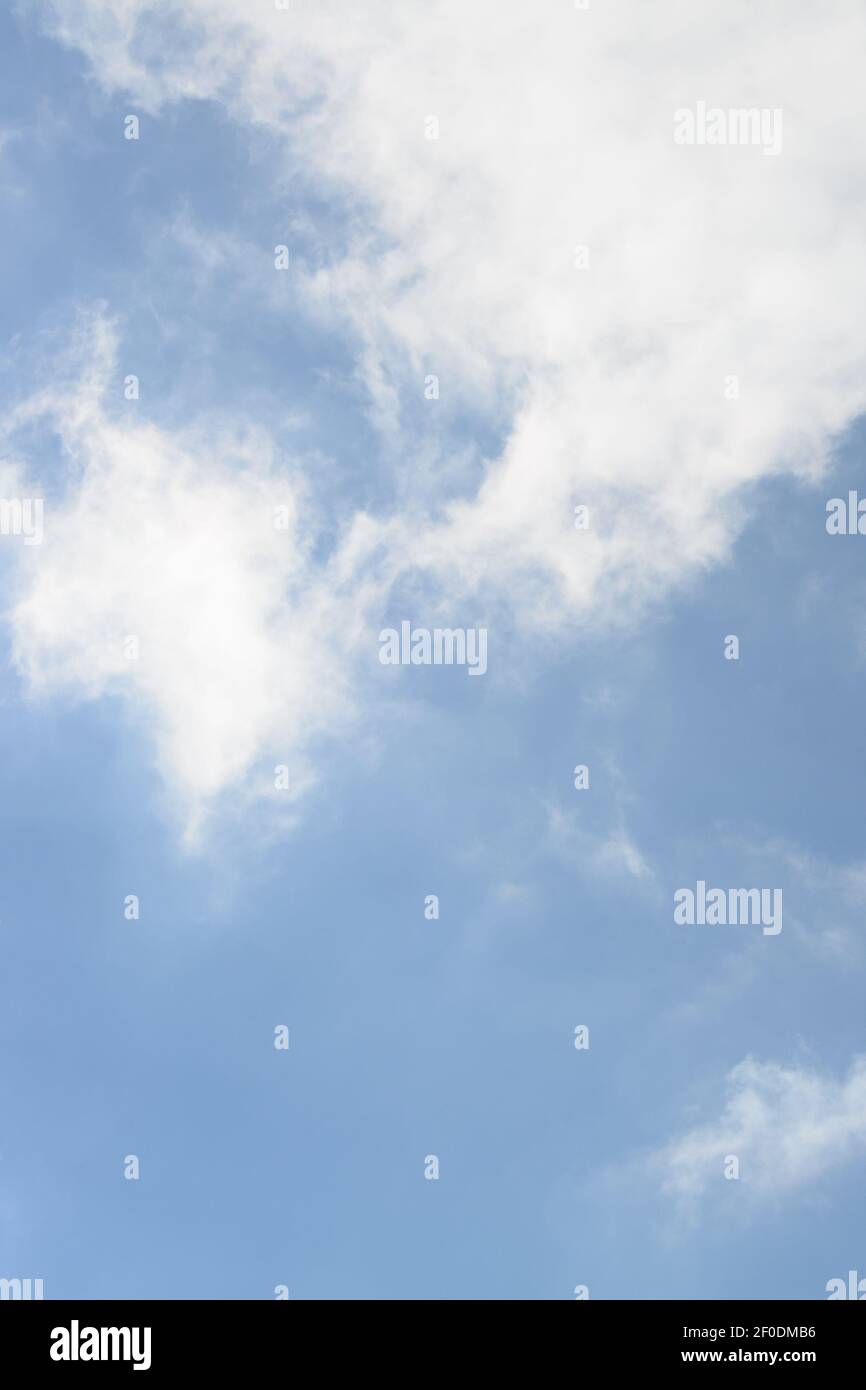 Background of spring blue sky with airy white clouds. Abstract ...