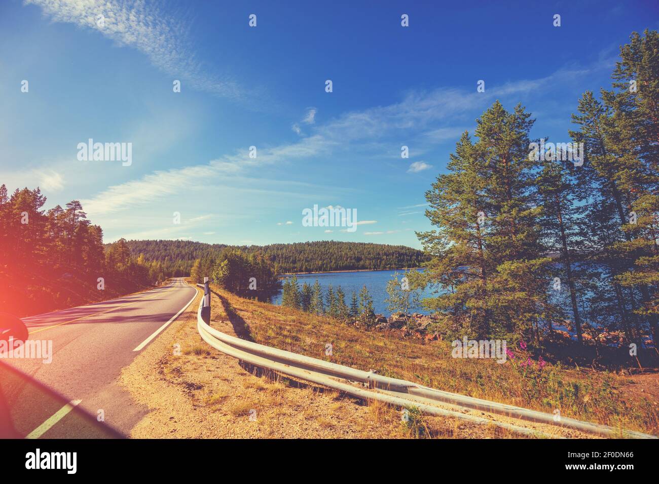 View from the car to the highway and the fjord. Driving through the ...