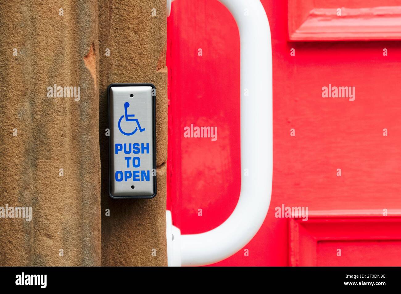 Disabled accessible push button buzzer for assistance sign at building ...