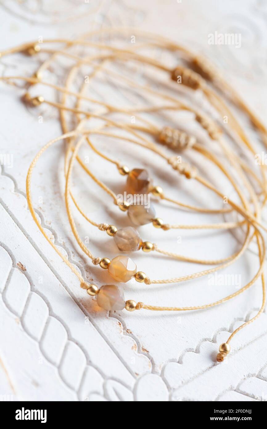 Agate mineral stone bead string jewelry bracelet on white background ...