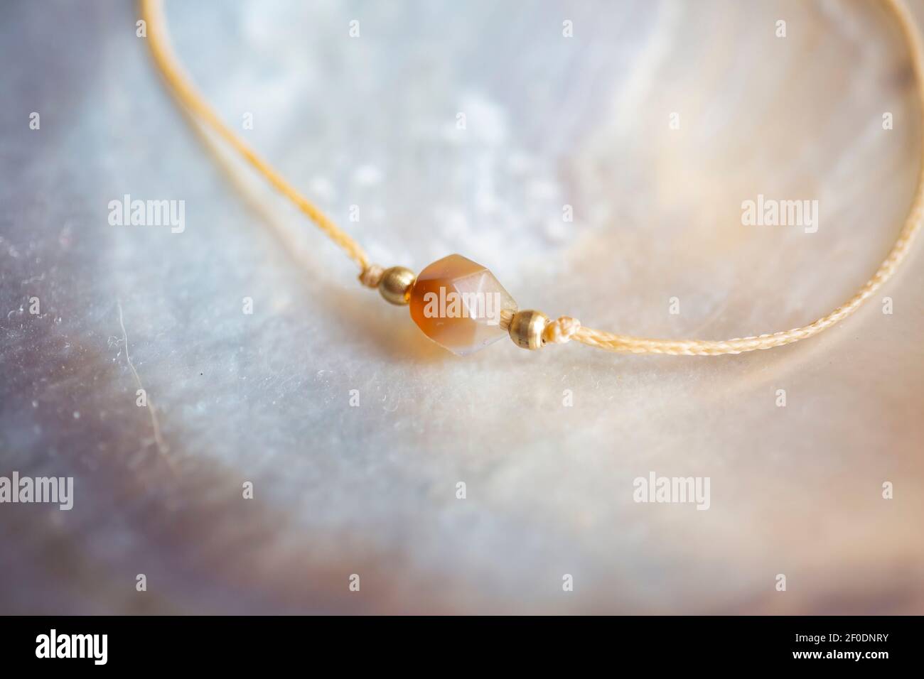 Agate mineral stone bead string jewelry bracelet on white background ...