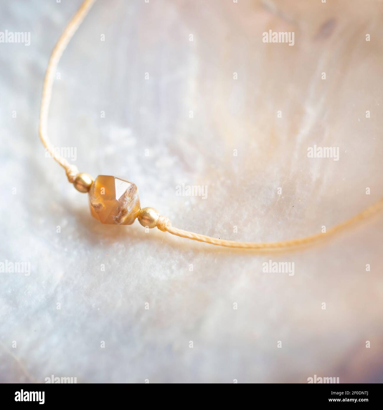 Agate mineral stone bead string jewelry bracelet on white background ...