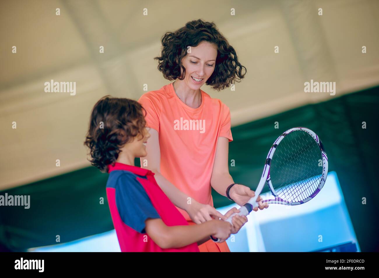 Gym woman racket hi-res stock photography and images - Alamy