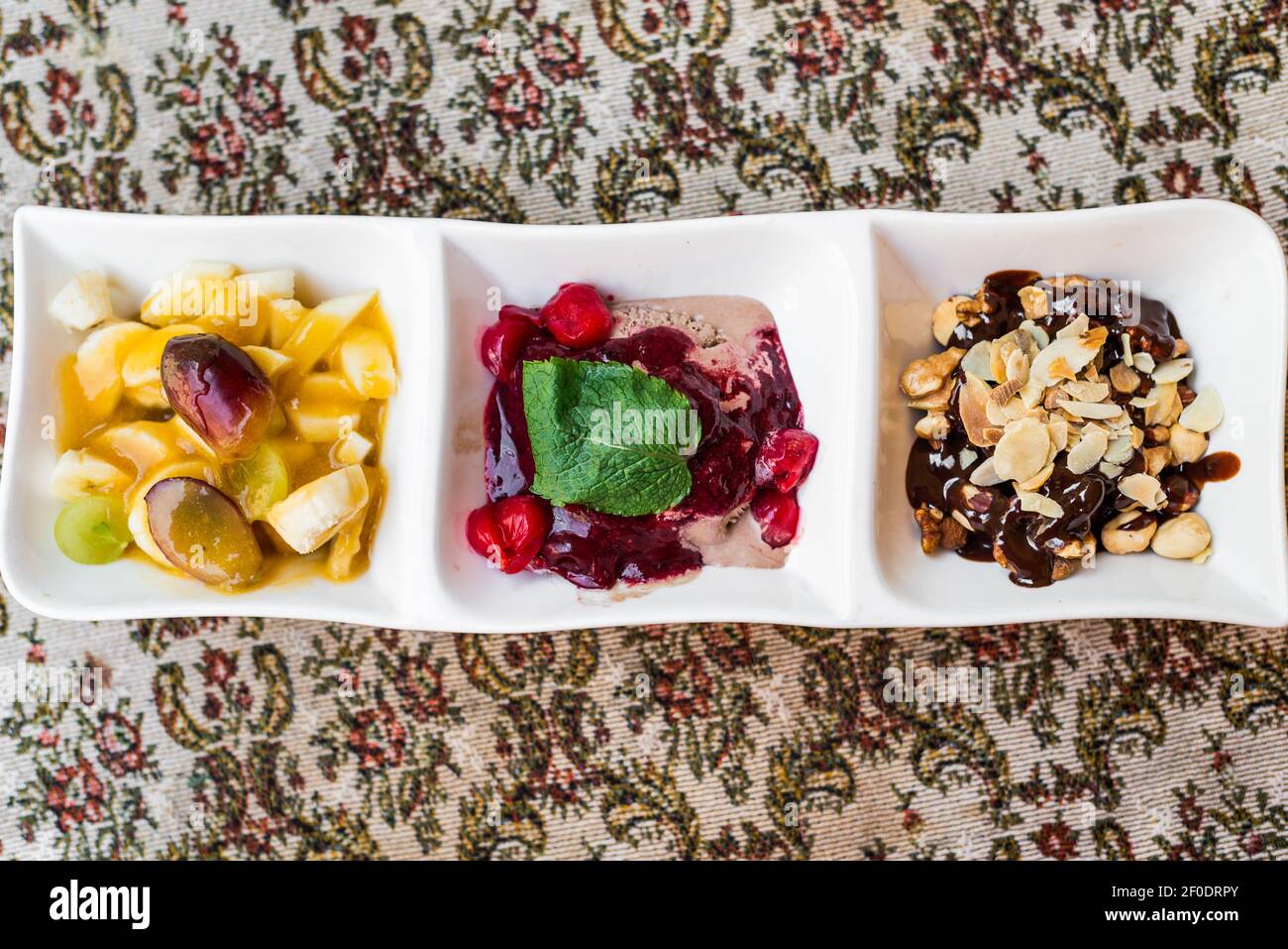 Sliced fruits, nuts and ice cream Stock Photo - Alamy