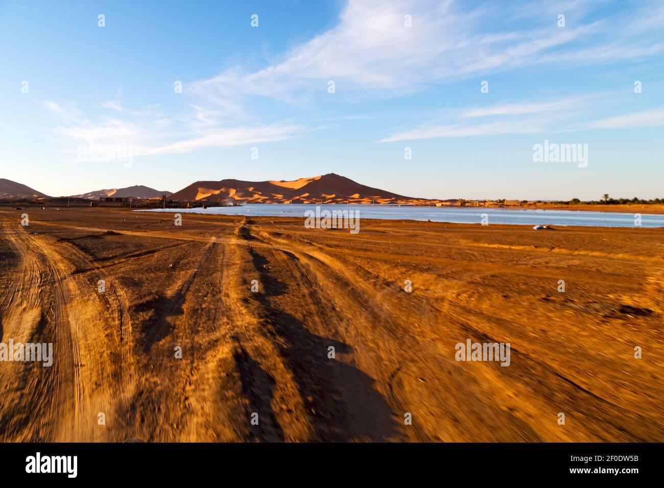 Sunshine in the lake yellow desert of morocco sand and dune Stock Photo ...