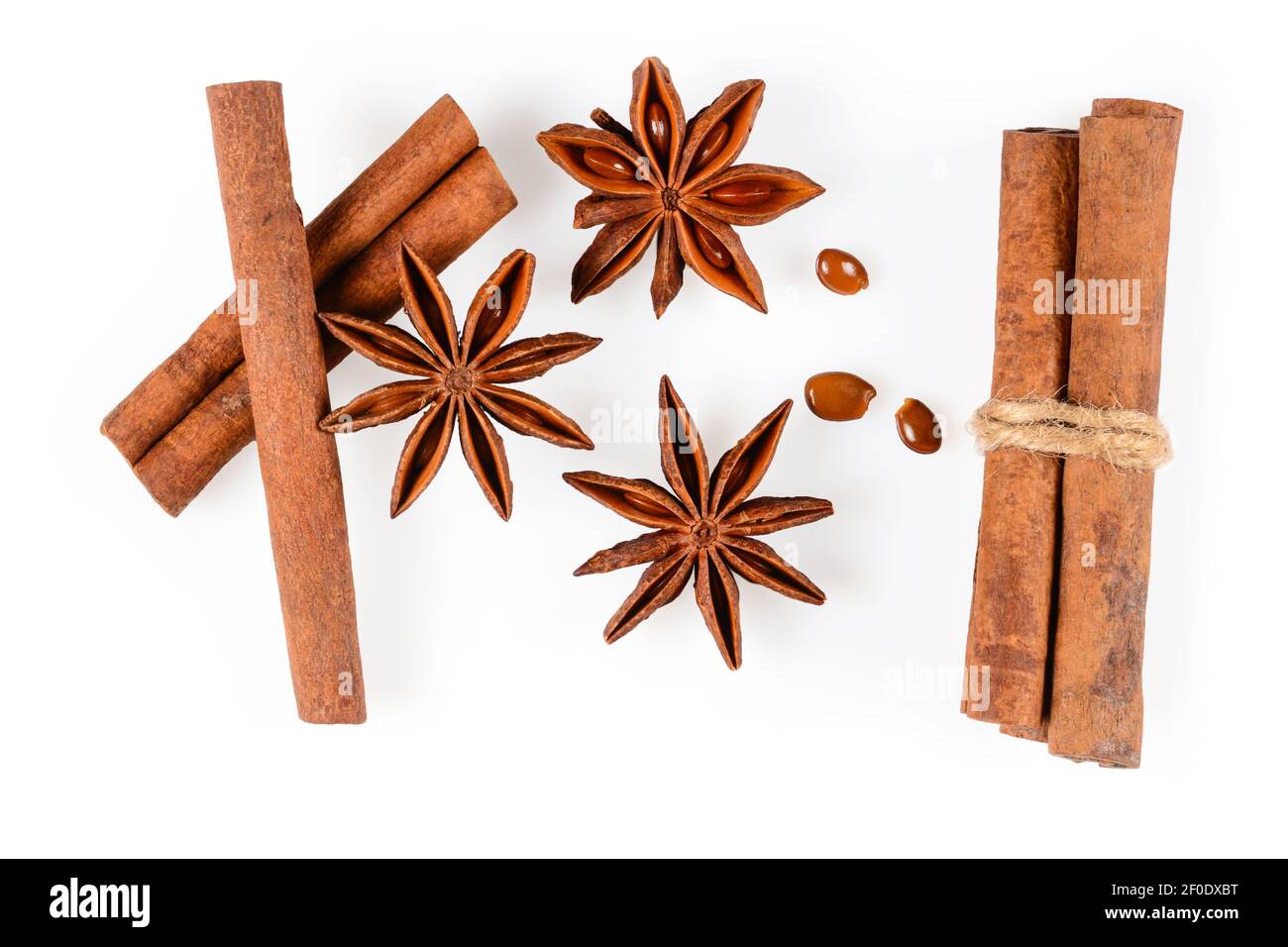 Cinnamon sticks and three anise star spice with seeds. Close-up macro ...