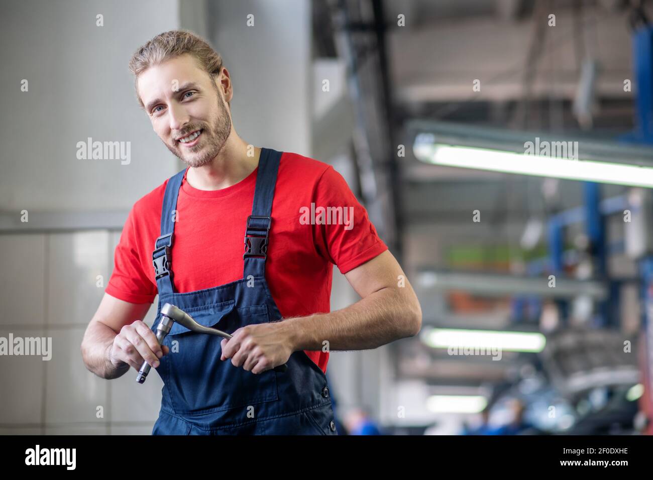 Man in work uniform hi-res stock photography and images - Alamy