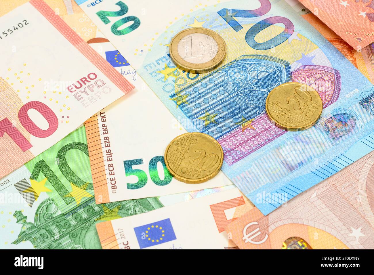 Euro coins and banknotes of different value. Various EU currency money ...