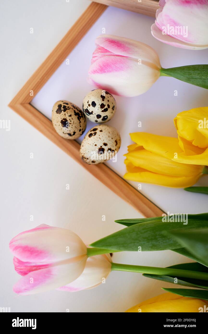 bouquet of spring tulips and easter eggs Festive spring concept Stock ...