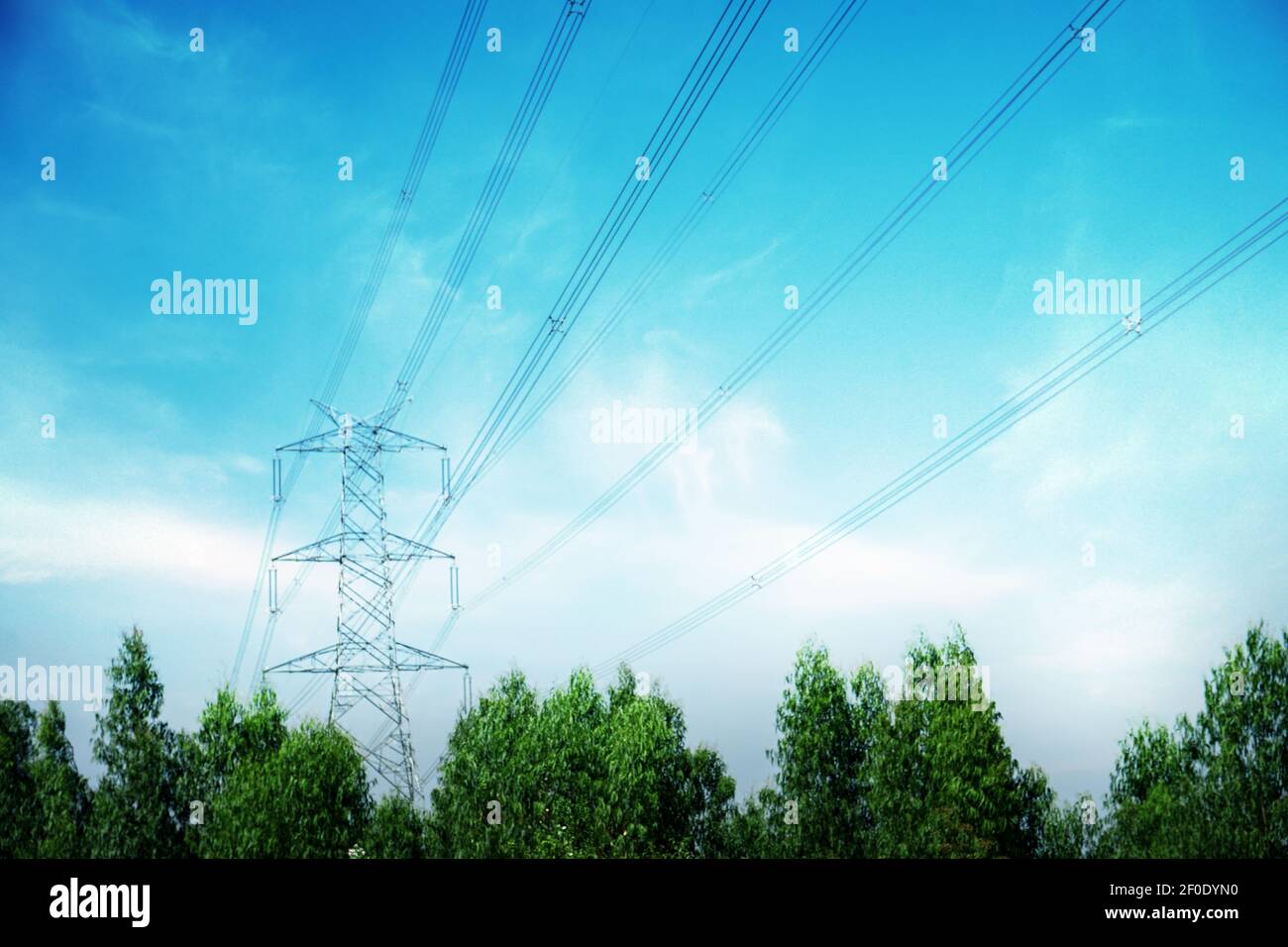 High voltage transmission towers line Stock Photo - Alamy