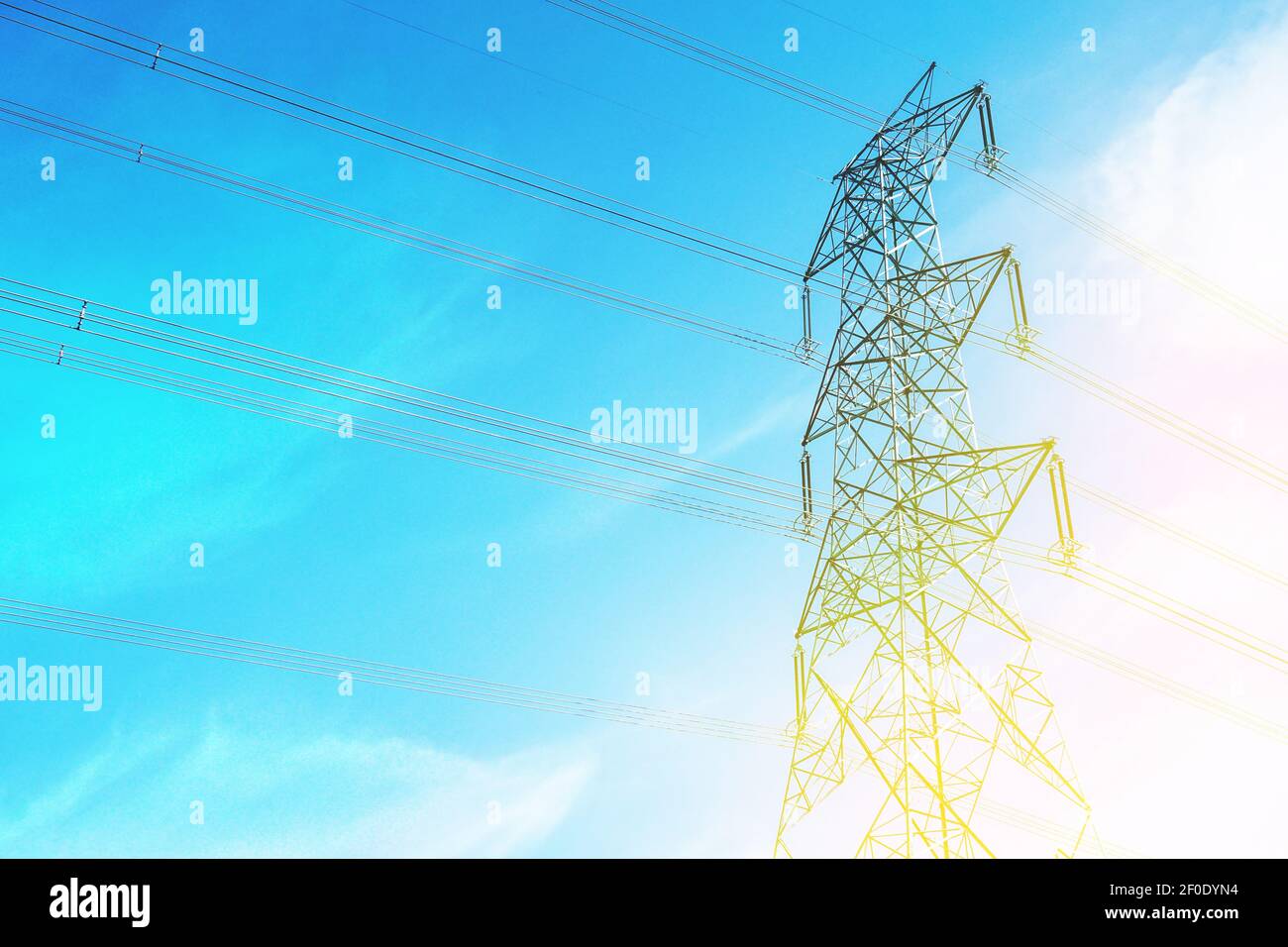 High voltage transmission towers line Stock Photo - Alamy