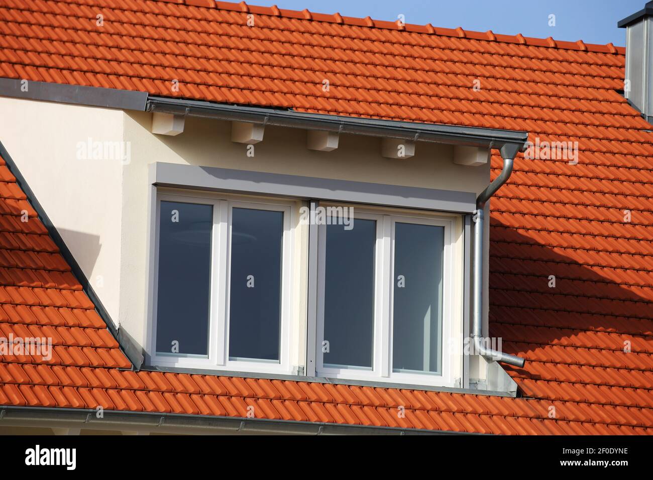 Large dormer on a newly tiled roof Stock Photo - Alamy