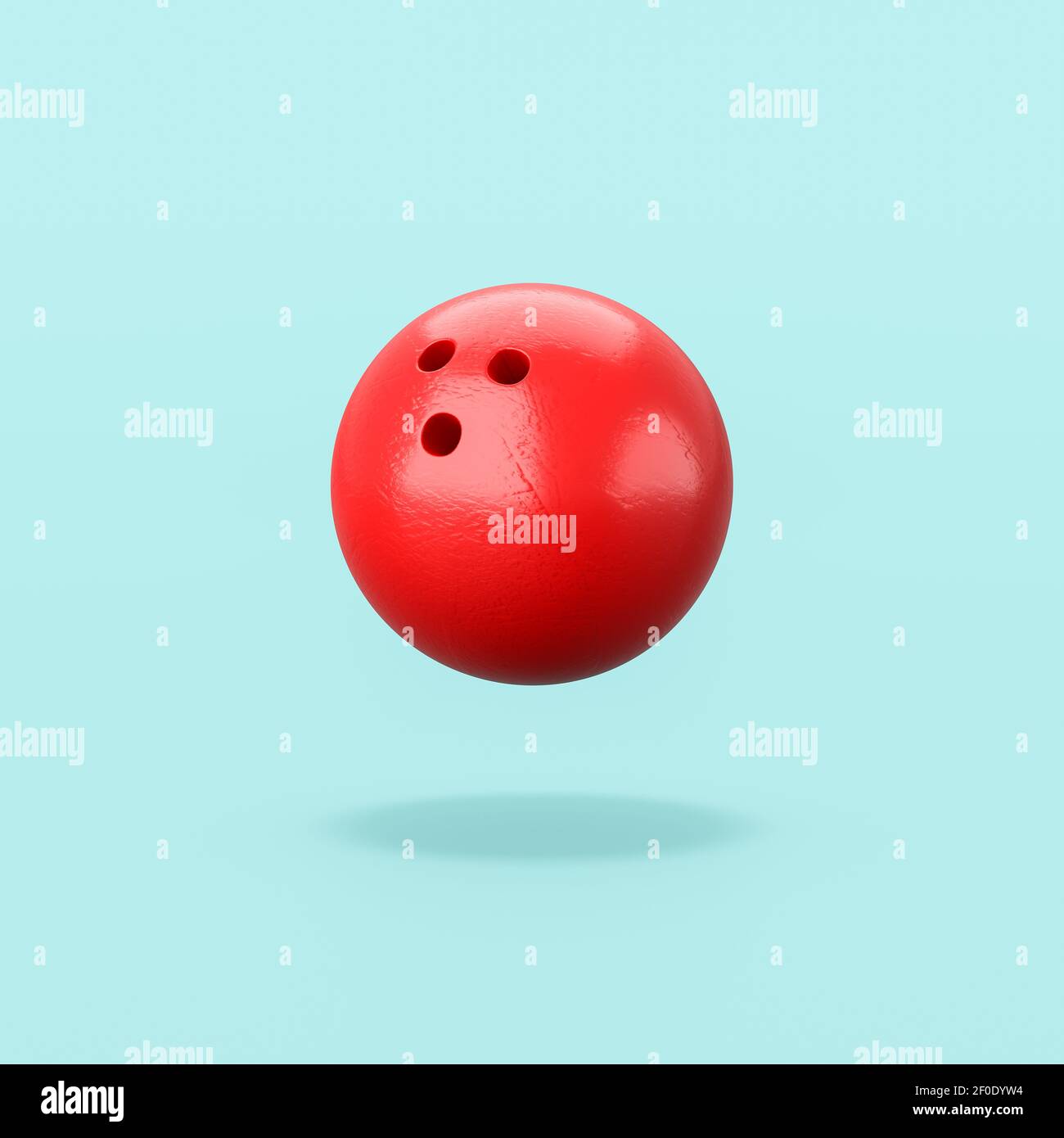 Red Bowling Ball on Blue Background Stock Photo - Alamy