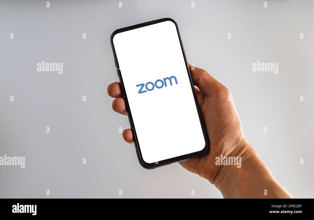 Meetings Cloud Zoom smart phone application that shows the logo. Online ...