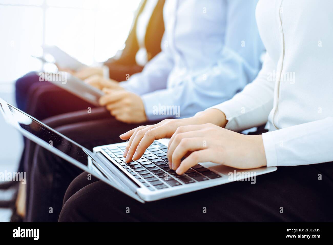 Group of diverse business people working in office, close-up. Woman ...