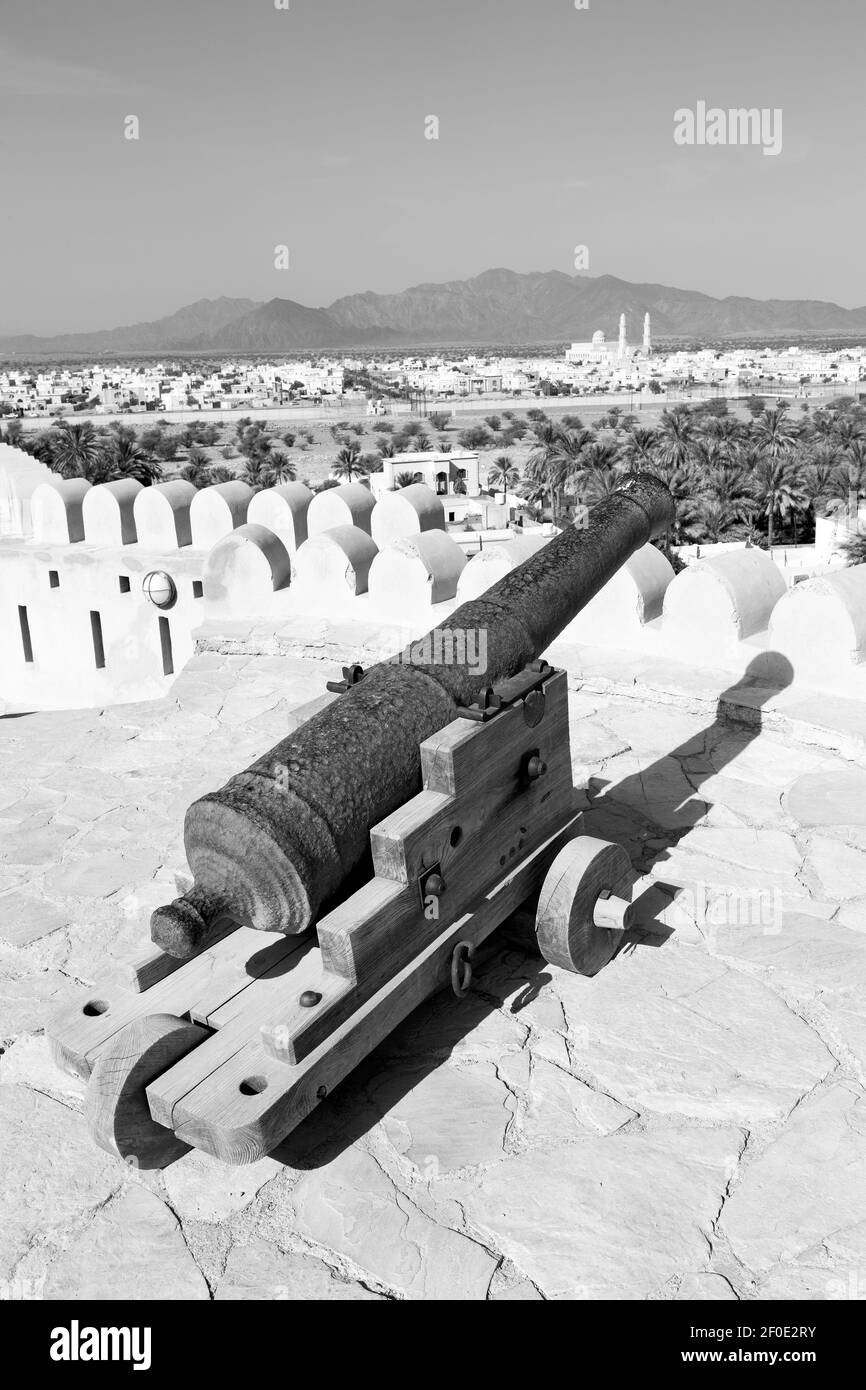 In oman muscat the old castle and cannon near the wall Stock Photo - Alamy