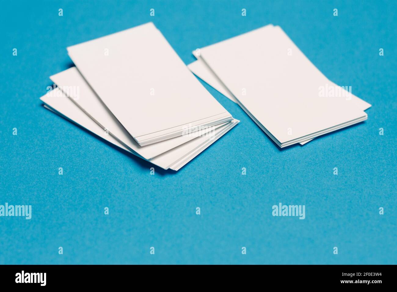 blank business cards on office desk blue background pens mocap Stock ...