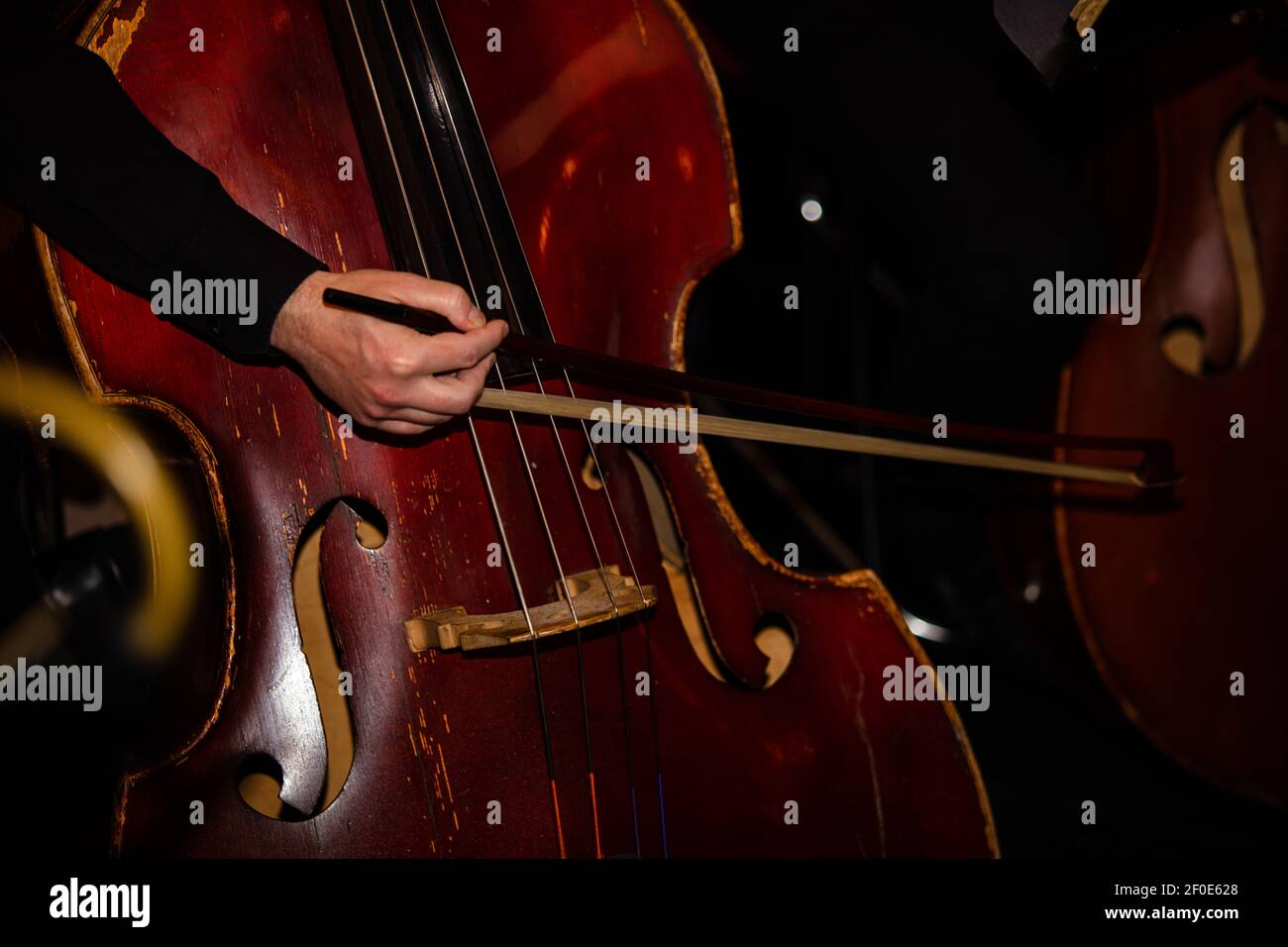 Hand playing cello hi-res stock photography and images - Alamy