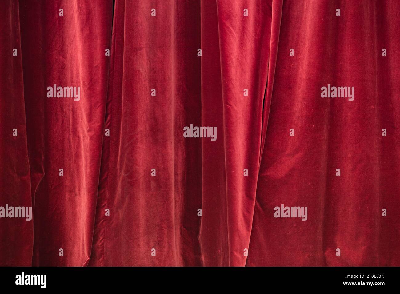 Red curtain in theatre background Stock Photo - Alamy