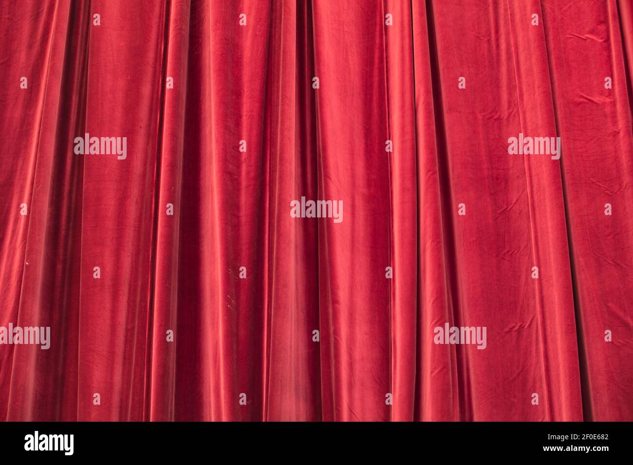 Red curtain in theatre background Stock Photo - Alamy