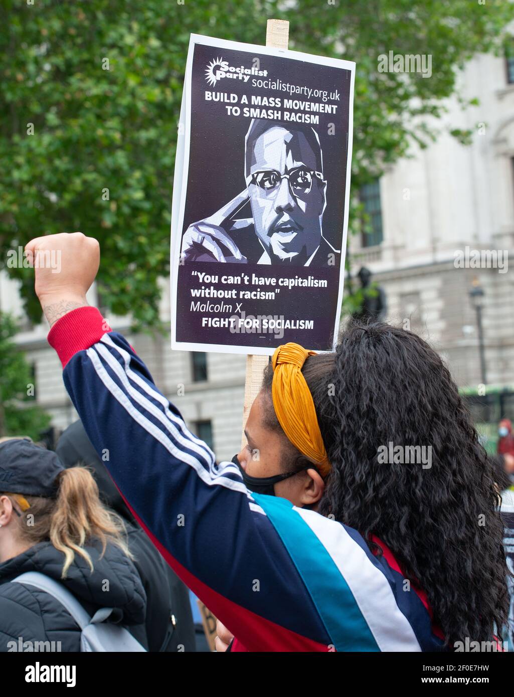 Anti-racism campaigner holding sign, at the Black Lives Matter ...