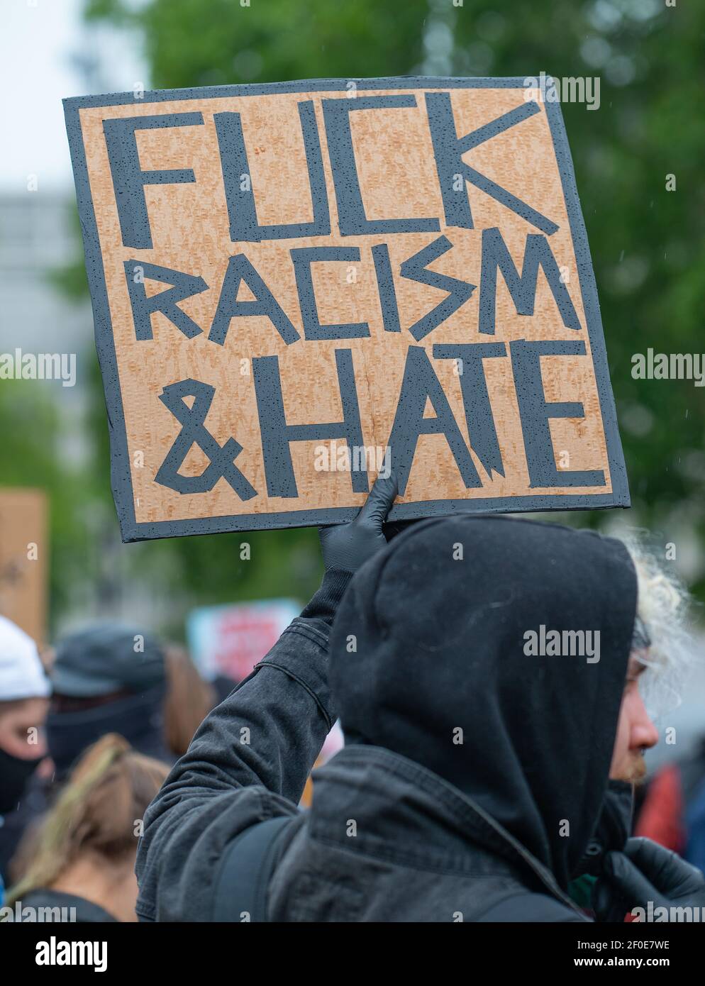 Anti-racism campaigner holding sign, at the Black Lives Matter ...