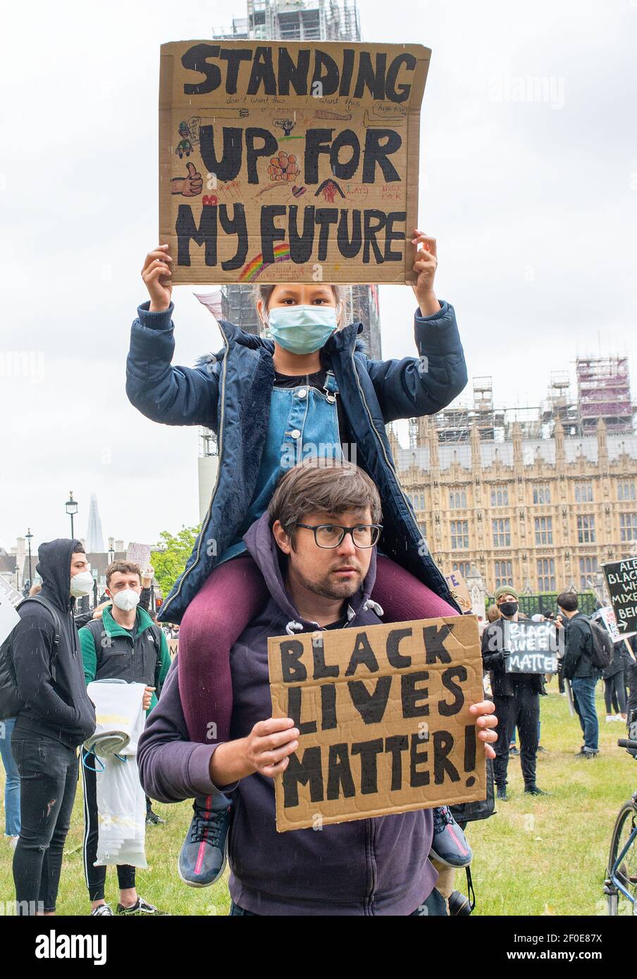 Anti-racism campaigners holding signs, at the Black Lives Matter ...
