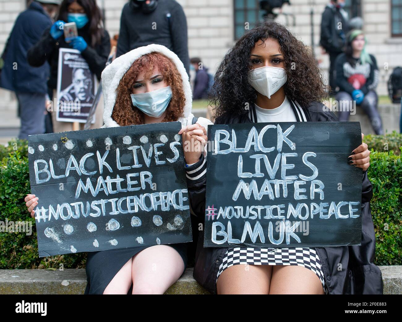 Anti-racism campaigners holding signs, at the Black Lives Matter ...