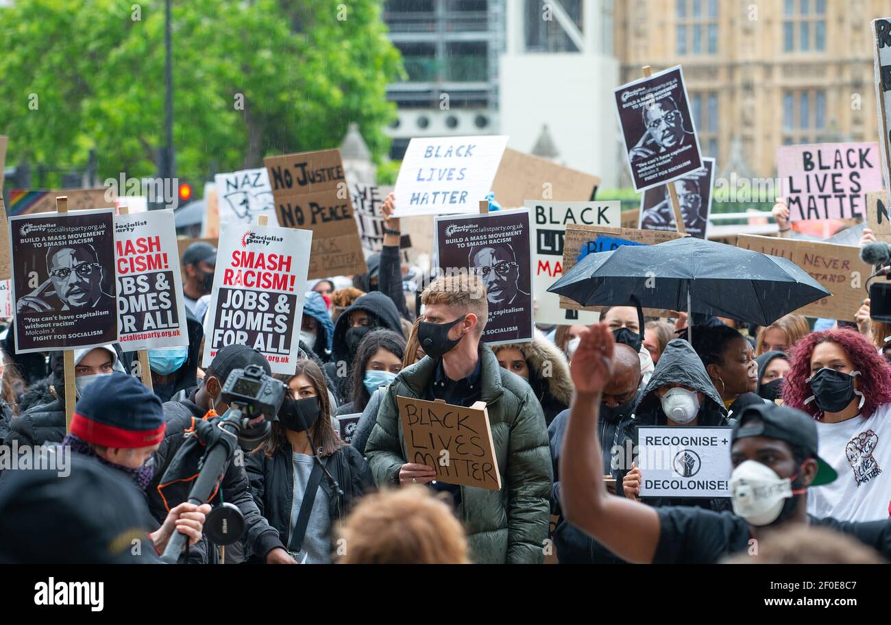 Anti-racism campaigners holding signs, at the Black Lives Matter ...