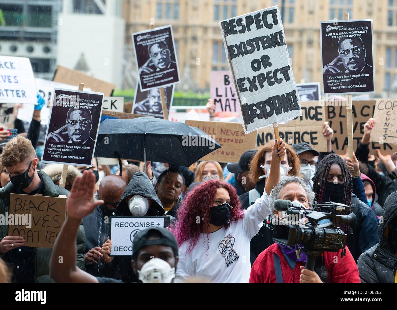 Anti-racism campaigners holding signs, at the Black Lives Matter ...