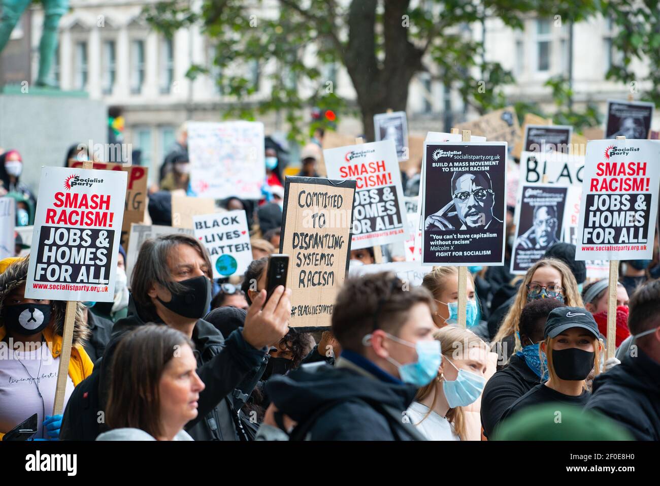 Anti-racism campaigners holding signs, at the Black Lives Matter ...