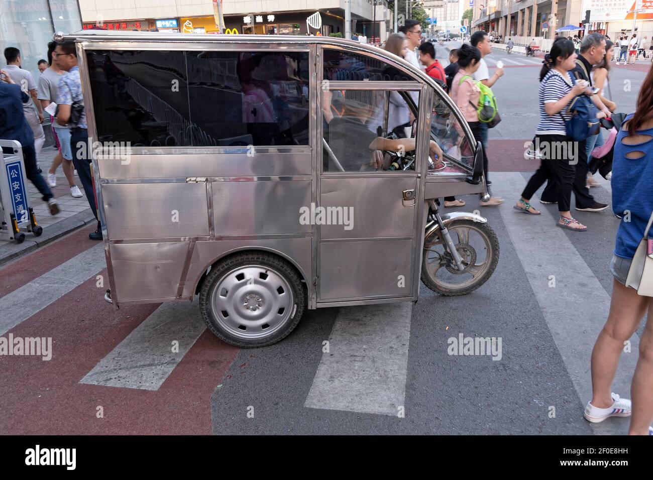 Beijing, China. 3rd June, 2017. Three-wheeled vehicle on the streets of ...