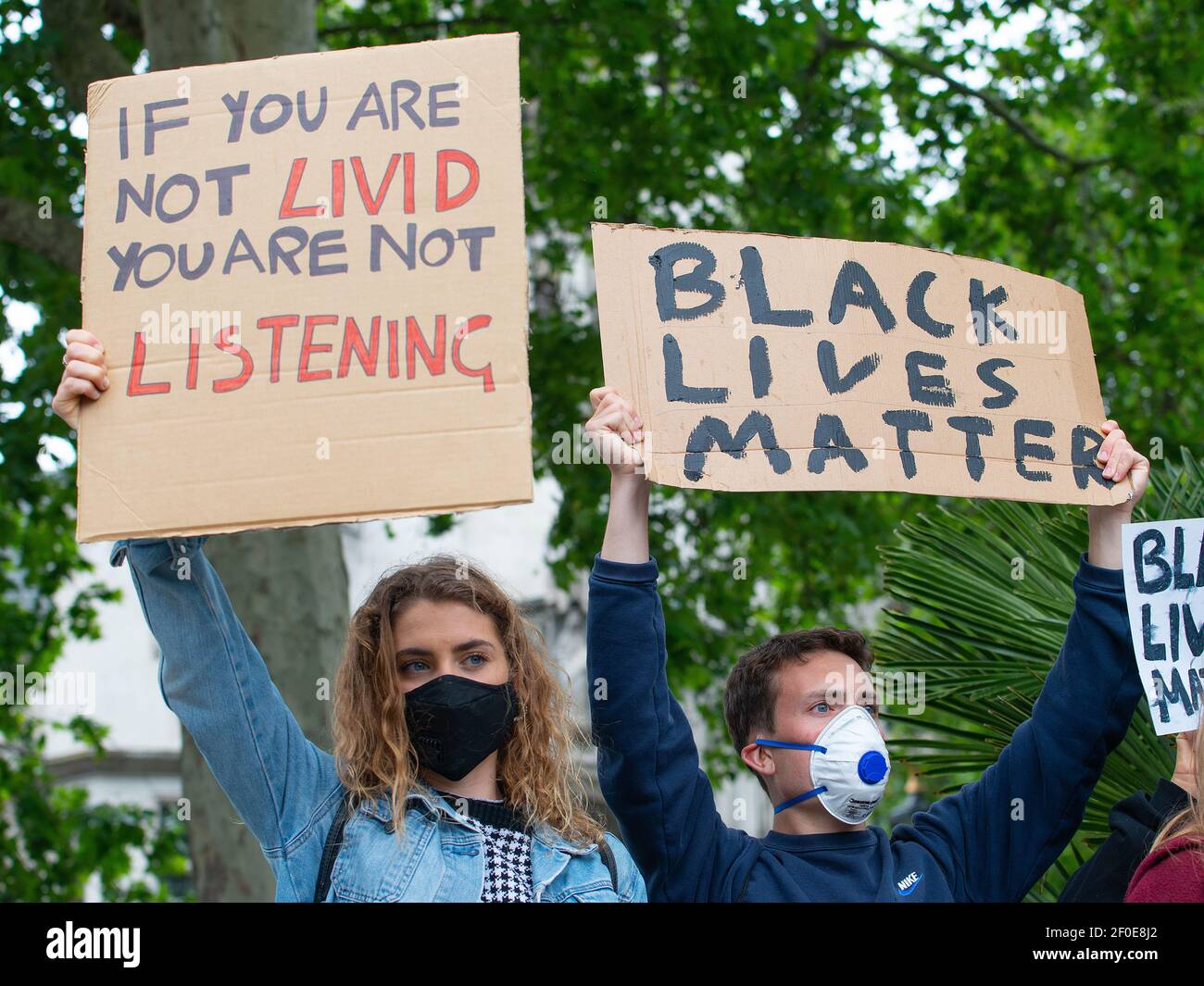 Anti-racism campaigners holding signs, at the Black Lives Matter ...