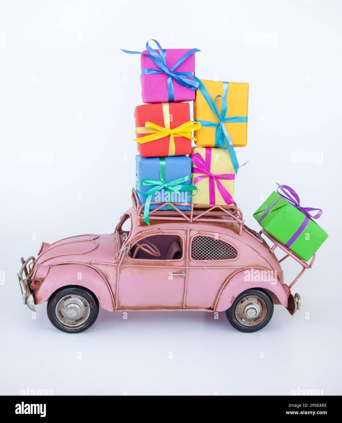 Vintage car loaded with gifts Stock Photo - Alamy