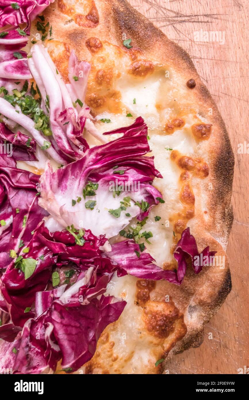 Italian pizza with mozzarella and radicchio Stock Photo - Alamy