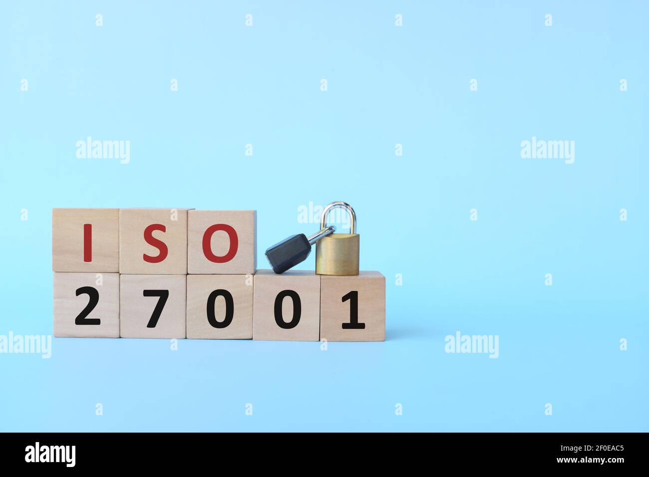 ISO 27001 on wooden blocks with padlock. Information security ...