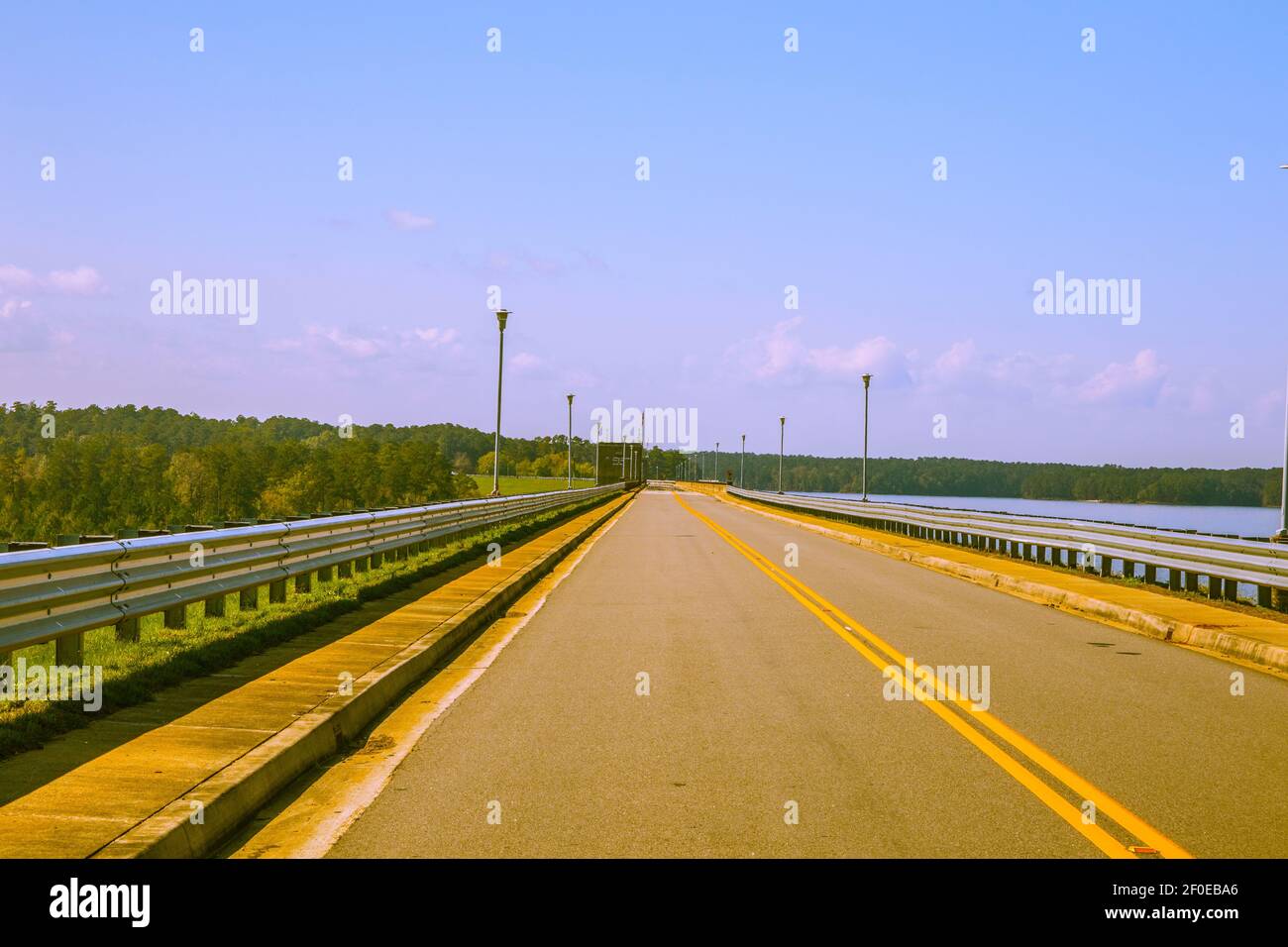 A long empty road by Lake Thurmond Stock Photo - Alamy