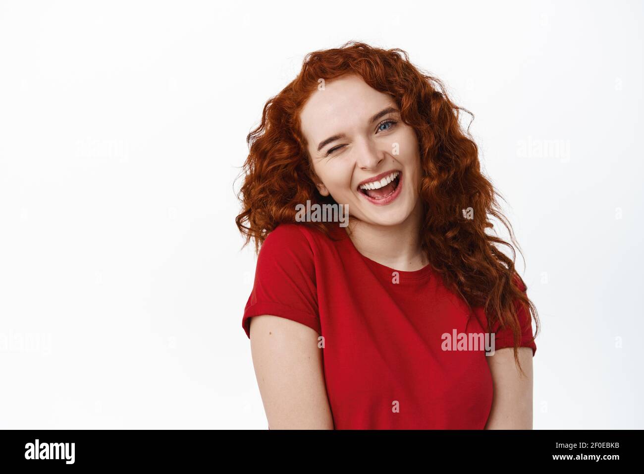 Close Up Portrait Of Silly Redhead Girl With Curly Hairstyle Tilt Head