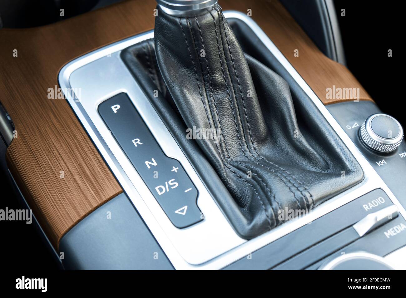 Automatic gear stick of a modern car. Modern car interior details ...