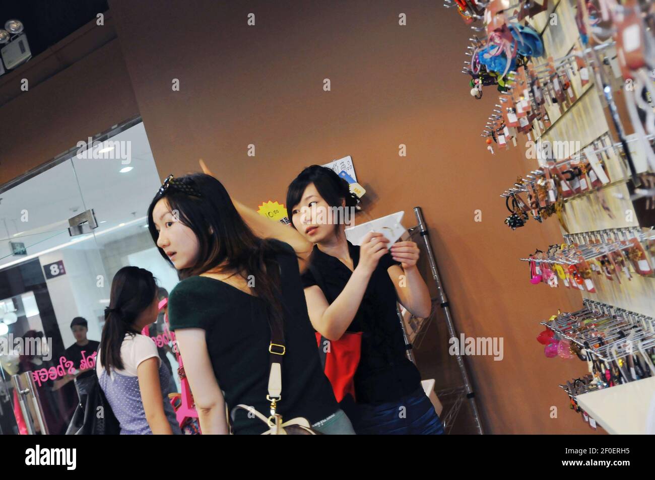 July 2009 - Beijing, China - Jia Qian (right) and Miao Miao (left) go ...
