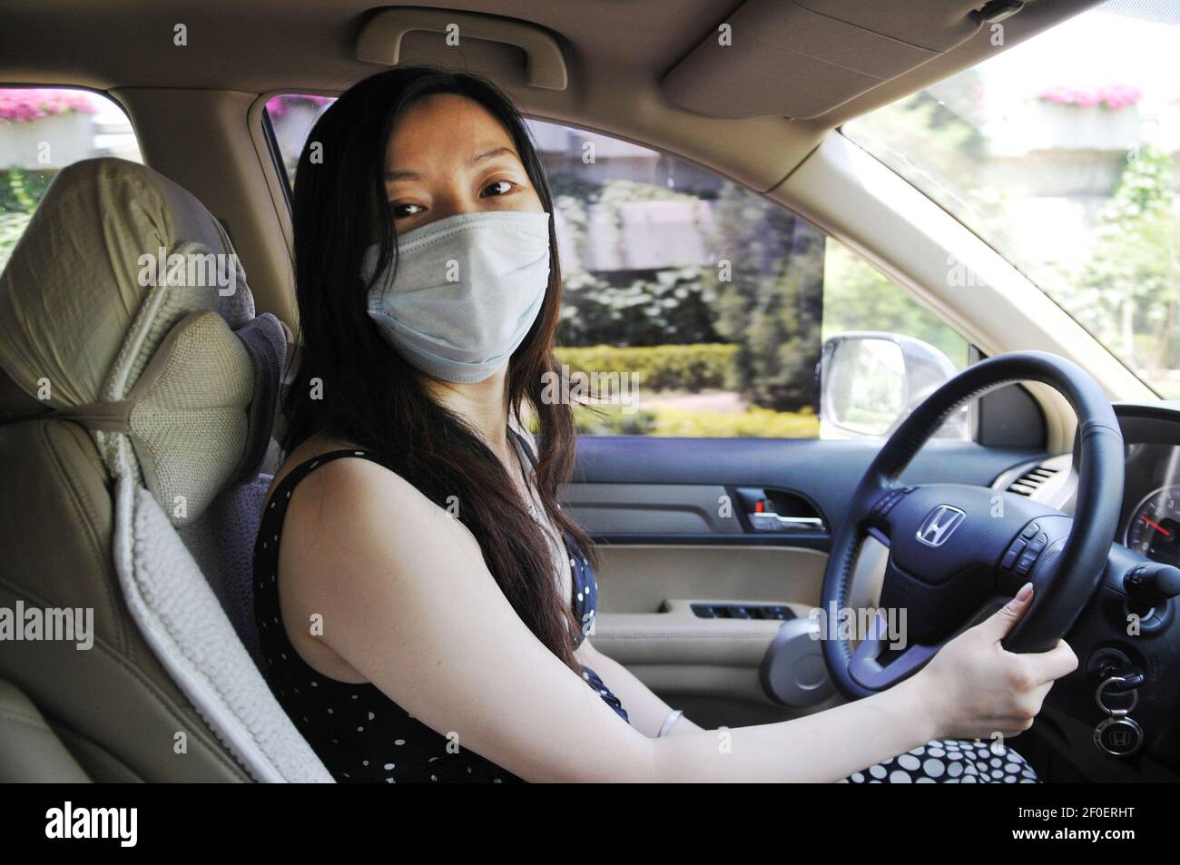 July 2009 - Beijing, China - Miao Miao on her way back from the clinic ...
