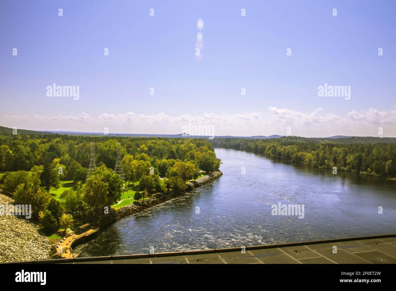 View of a river and green foliage from an elevated position in the ...